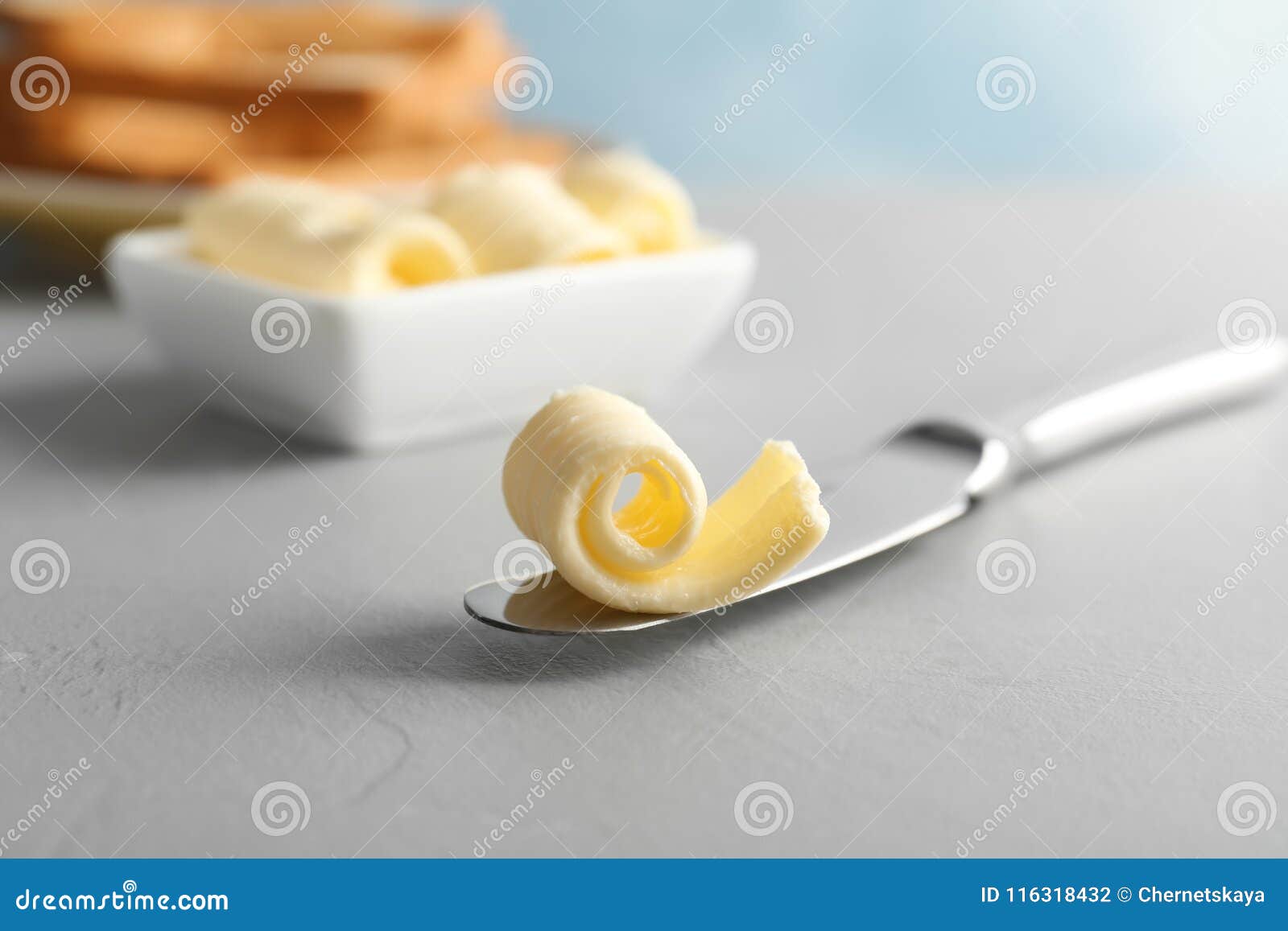 Knife with Fresh Butter Curl Stock Photo - Image of natural, curl ...
