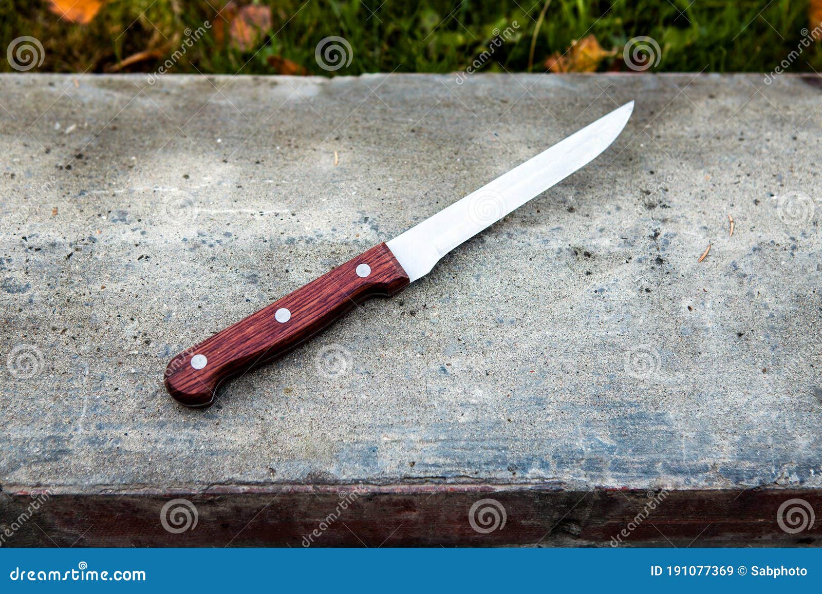 Knife on the Ground stock image. Image of blade, concrete - 191077369