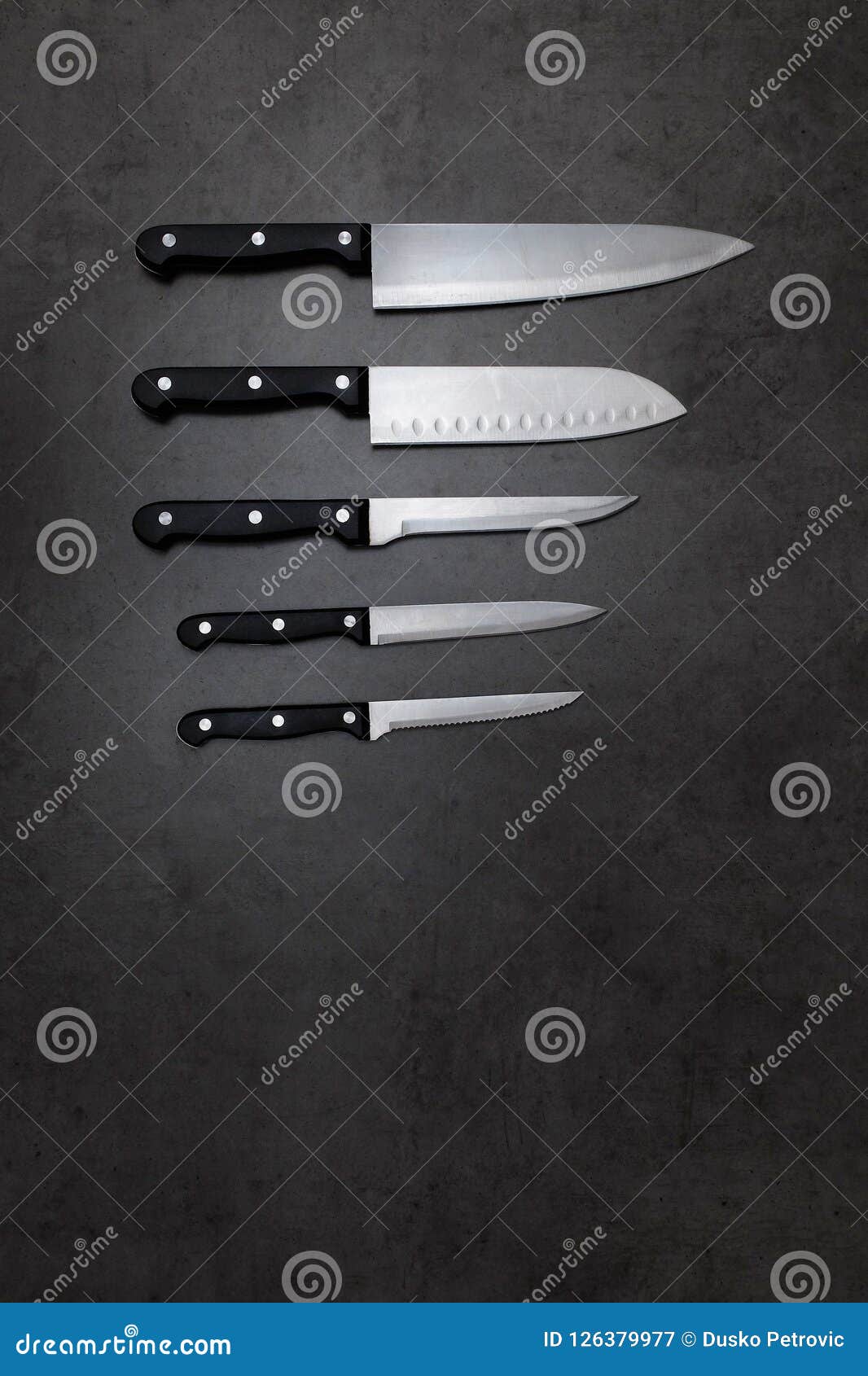 Knife Set on a Dark Gray Table Stock Image - Image of steel, silver ...