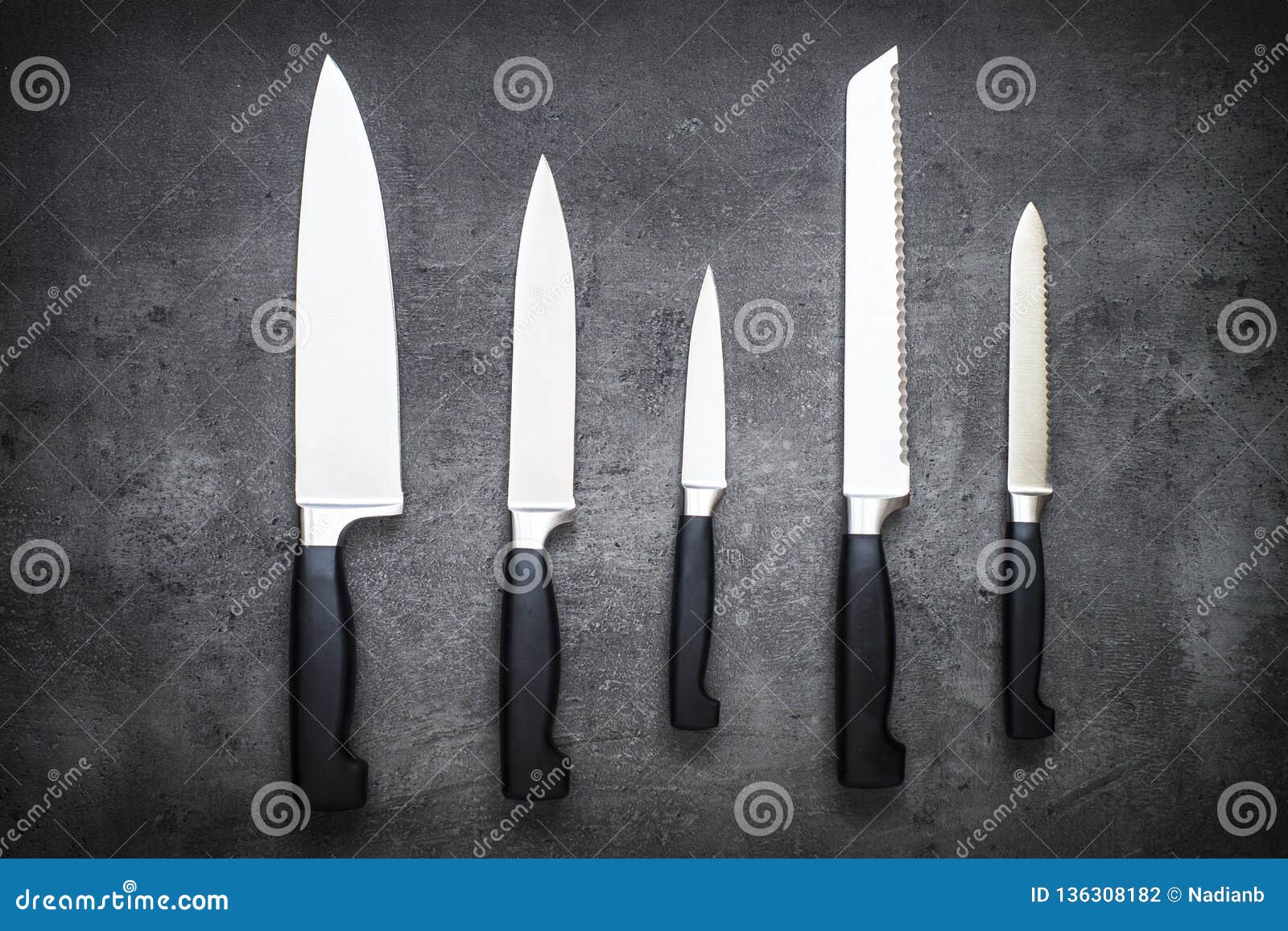 Knife set on the table. stock photo. Image of background - 136308182