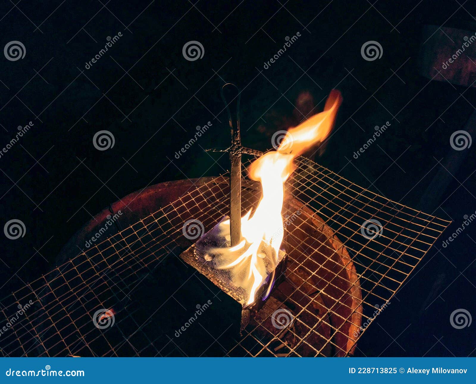 Knife in the Shape of a Cross in a Burning Fire Stock Image - Image of ...