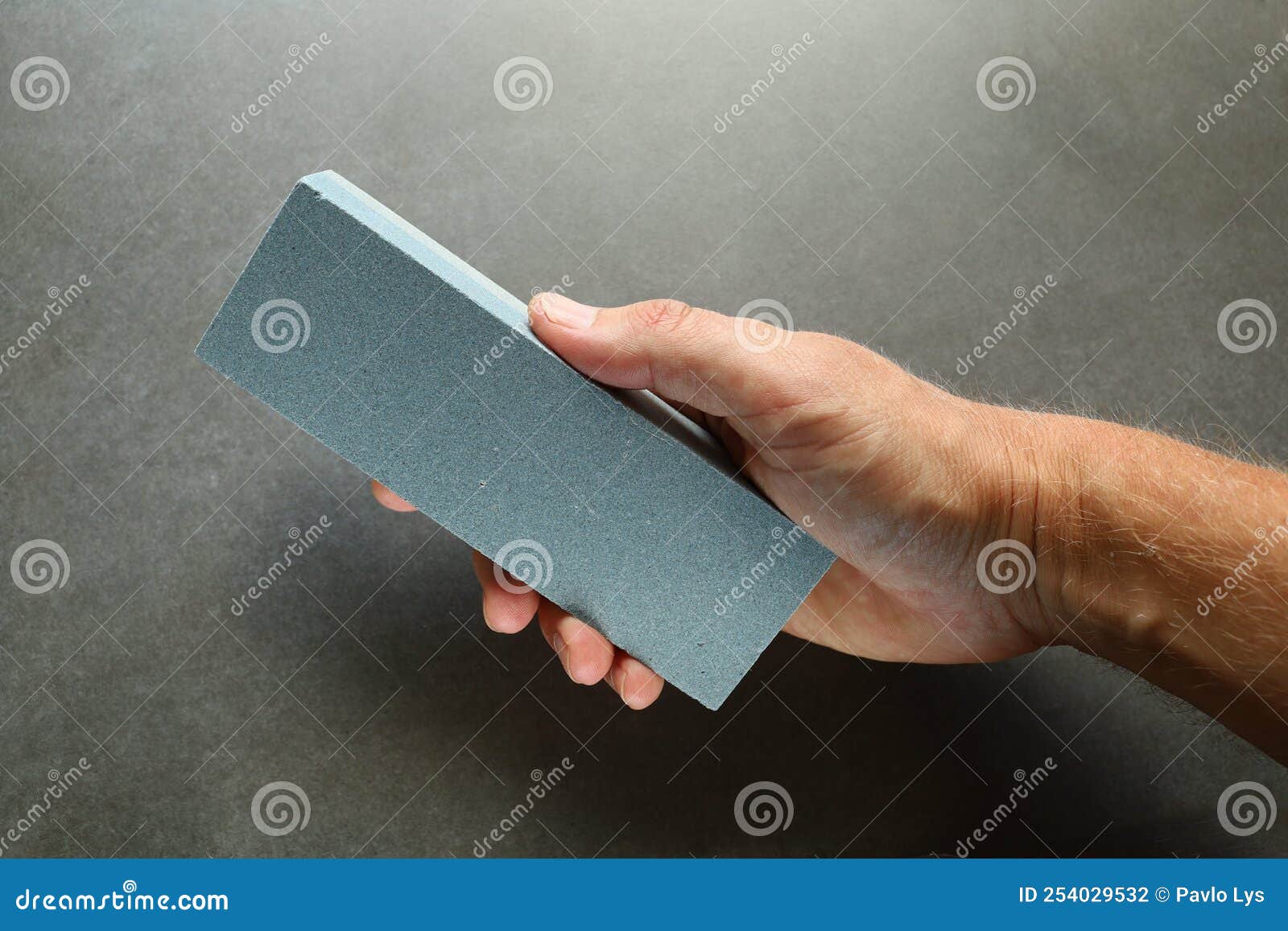 Knife Sharpener in Hand. Grinding Bar Stock Photo - Image of sharpen ...