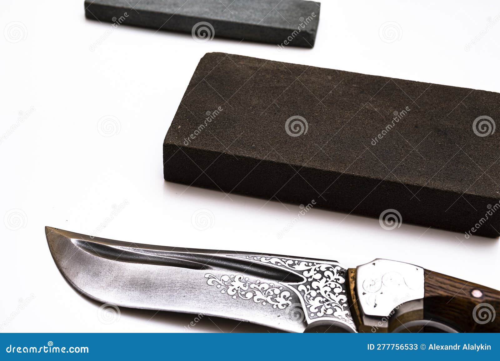 Knife Sharpening, Knife on Isolated White Background with Abrasive ...