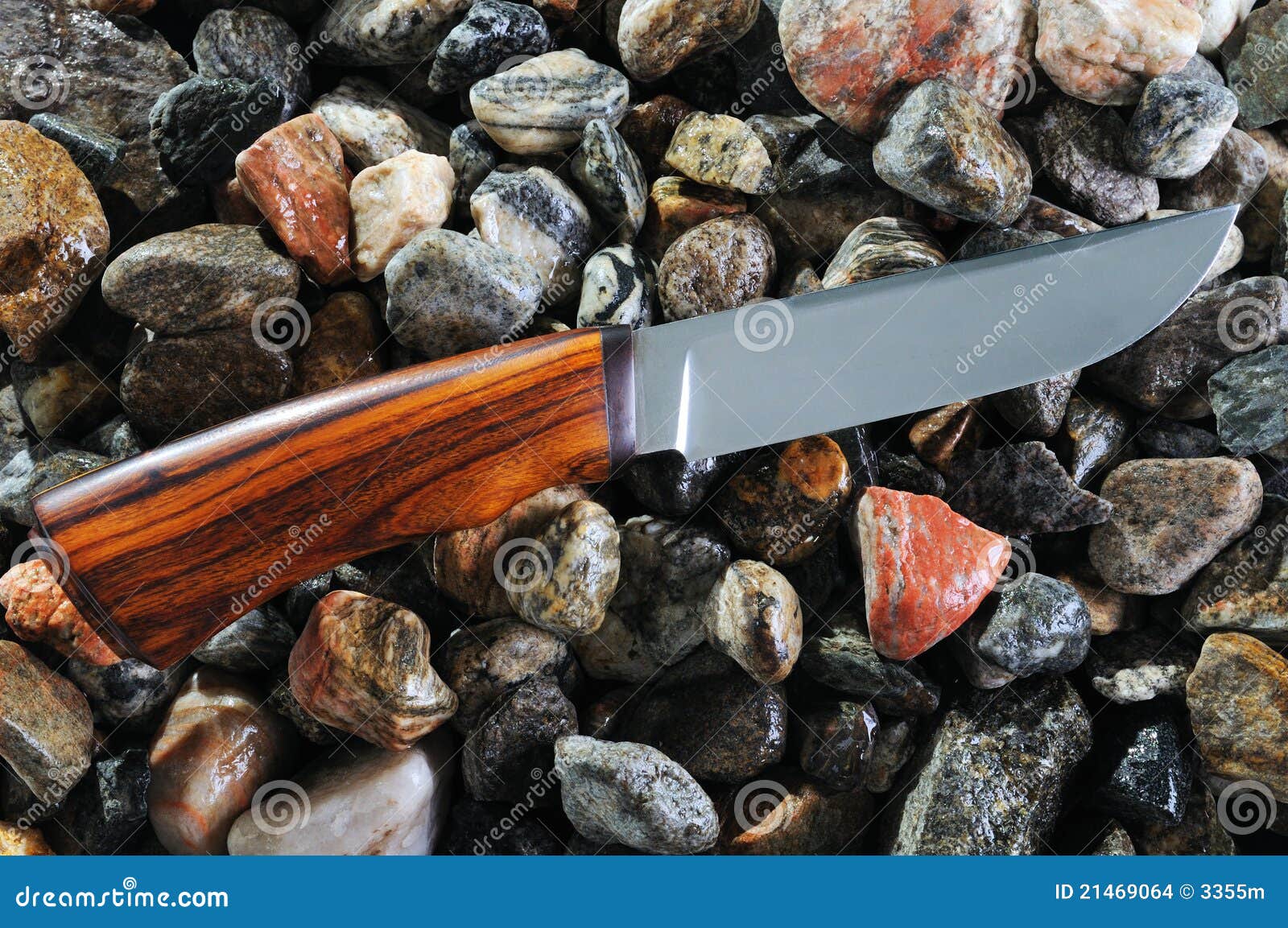 Knife on stones stock photo. Image of knife, wood, pebble - 21469064