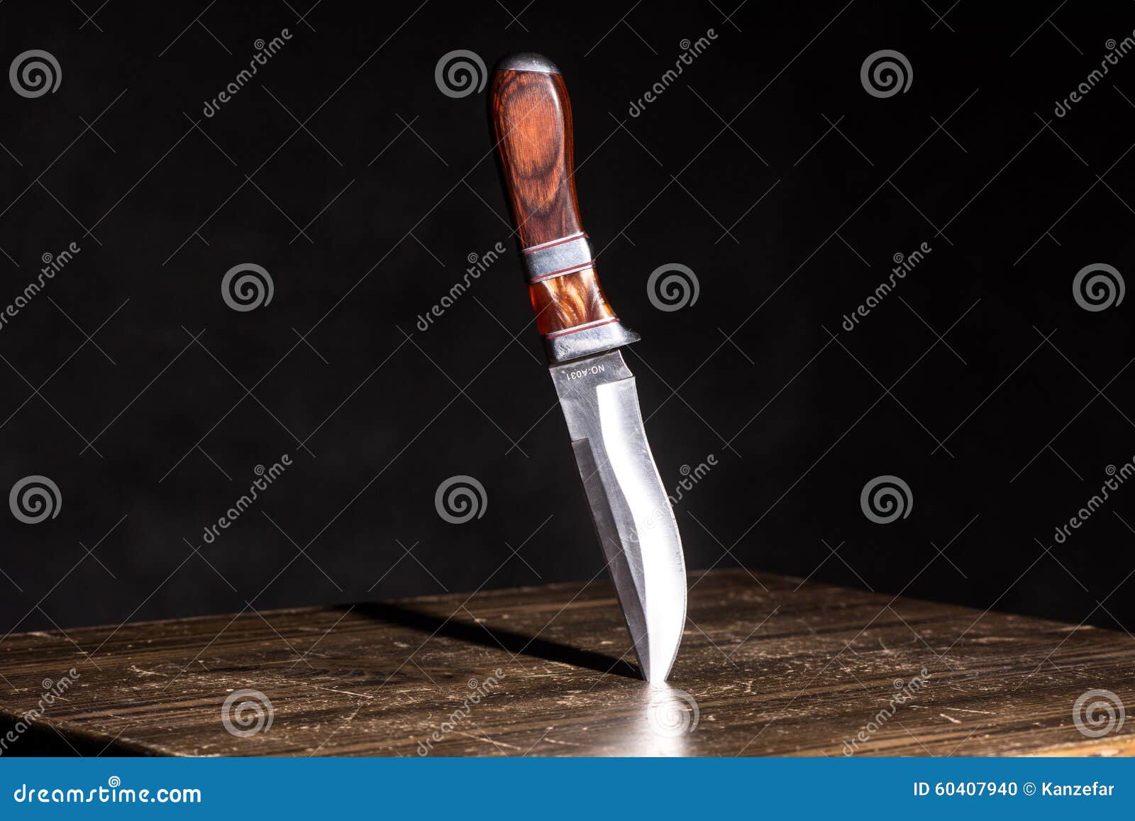 Knife Stuck in a Table on a Black Background Stock Photo - Image of ...