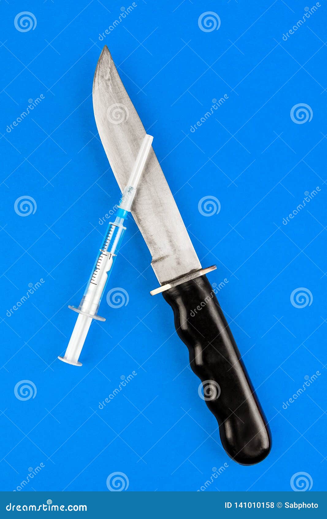Knife and a Syringe stock photo. Image of weapon, squirt - 141010158