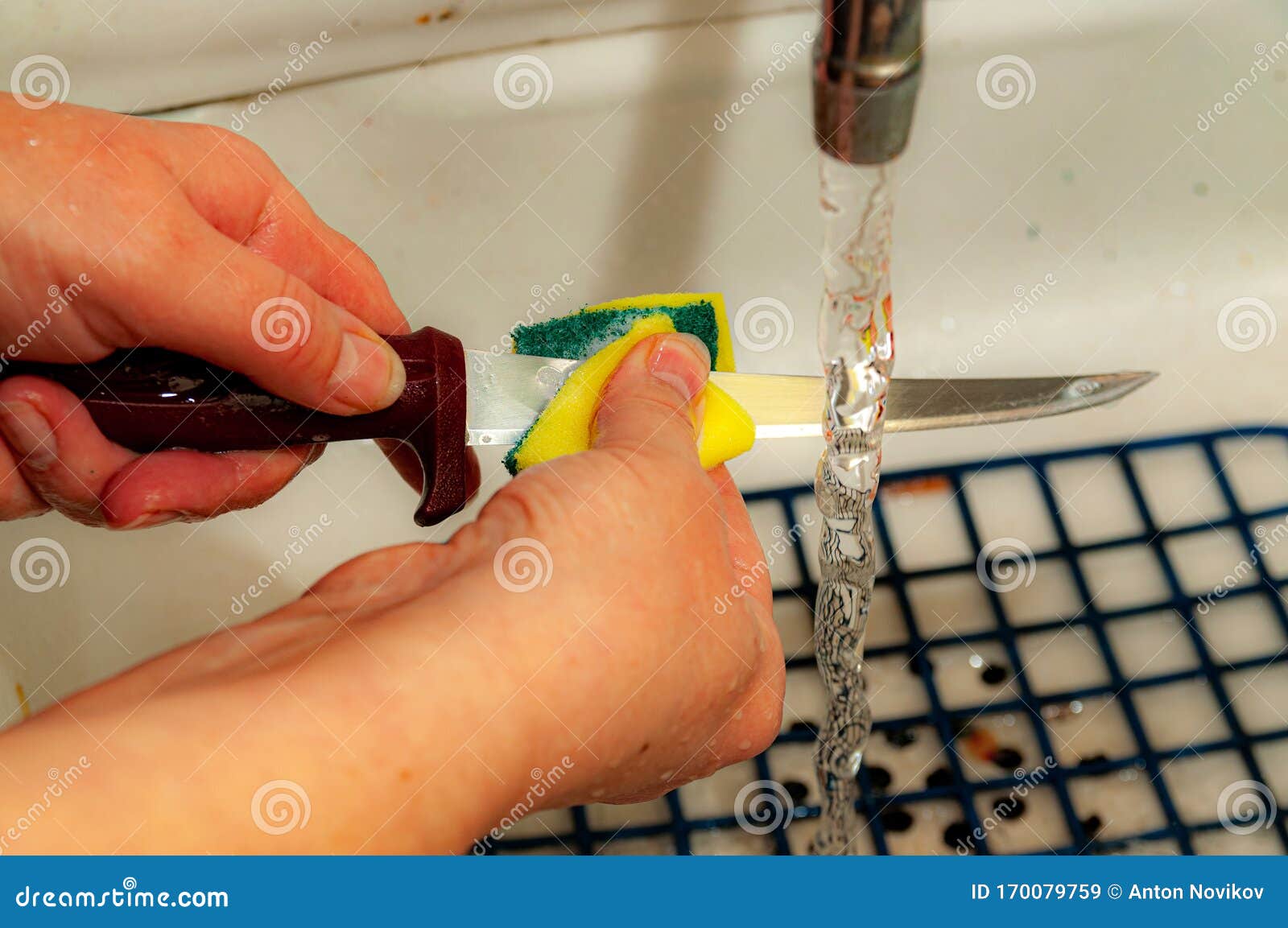 Knife Washed in the Sink Under a Stream of Water Stock Image - Image of ...