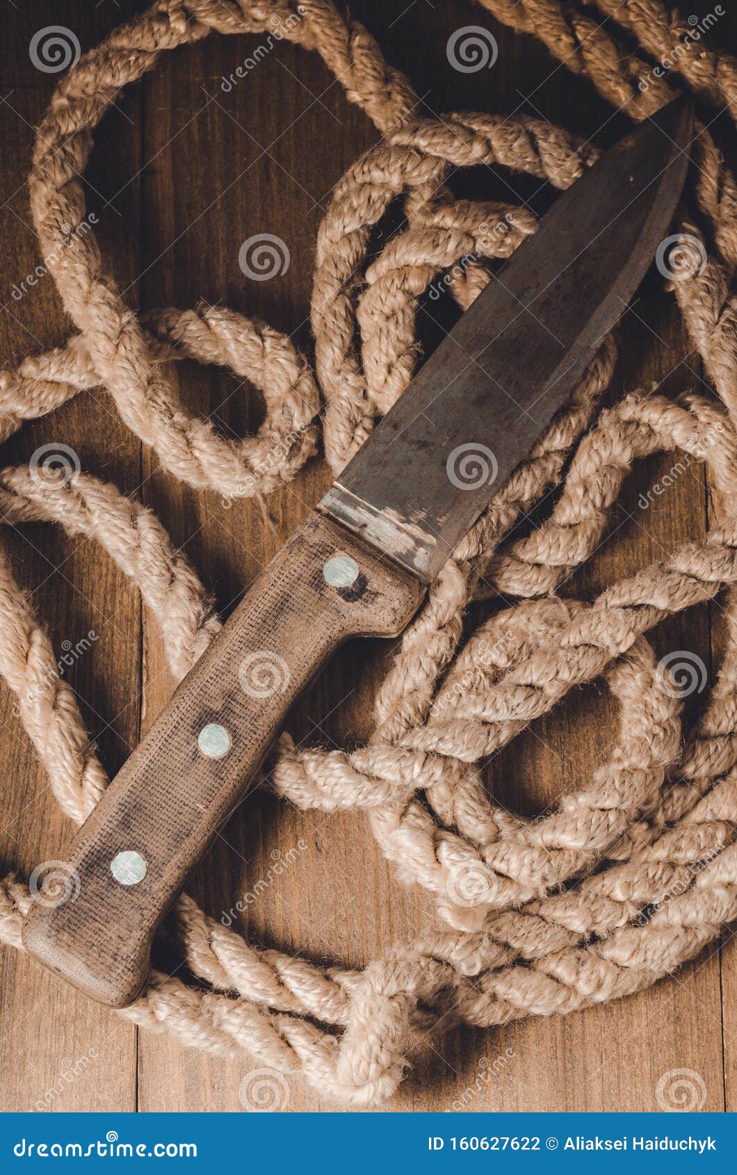 Knife with Wooden Handle and Rope on Old Wooden Background. Top View ...