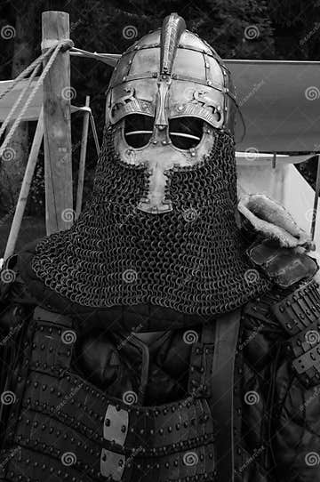 Knight Armor on Display with Shield and Weapons Stock Photo - Image of ...