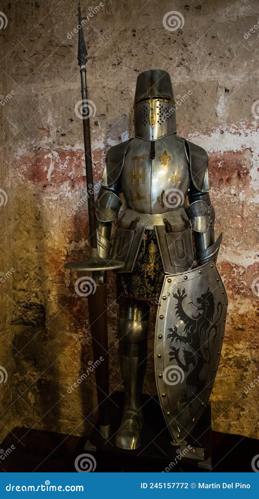 Knight In Armor With Shield And Sword Leaned Against The Wooden Railing ...