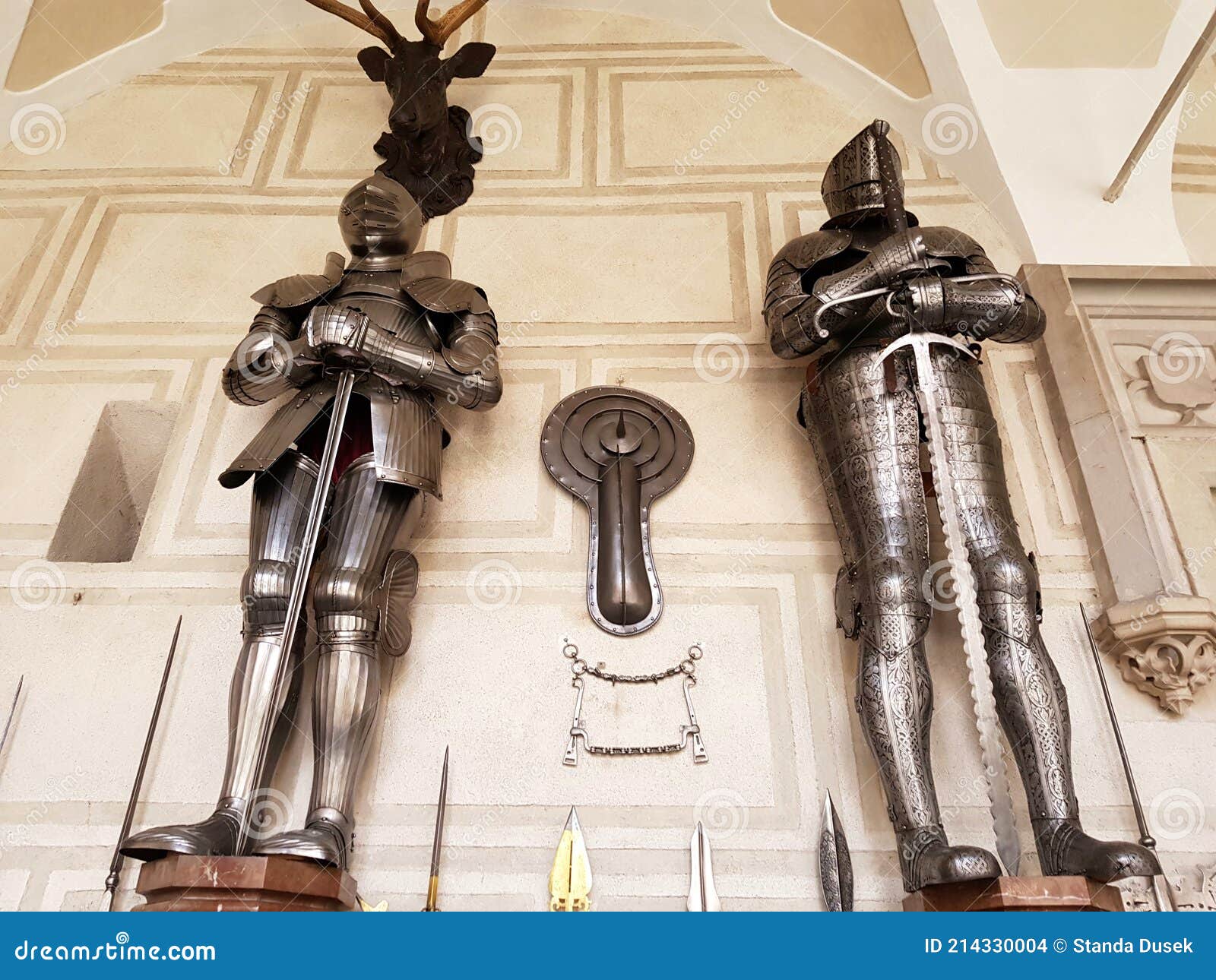 Knight armor with swords editorial stock image. Image of figurine ...