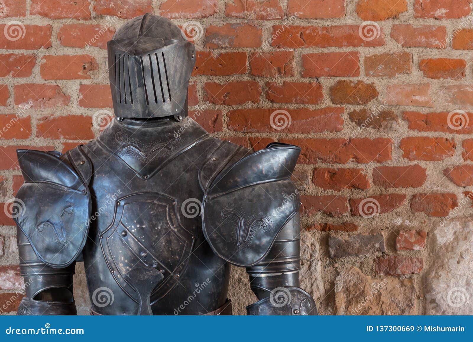 Knight Armour Against Brick Wall Background Stock Image - Image of ...