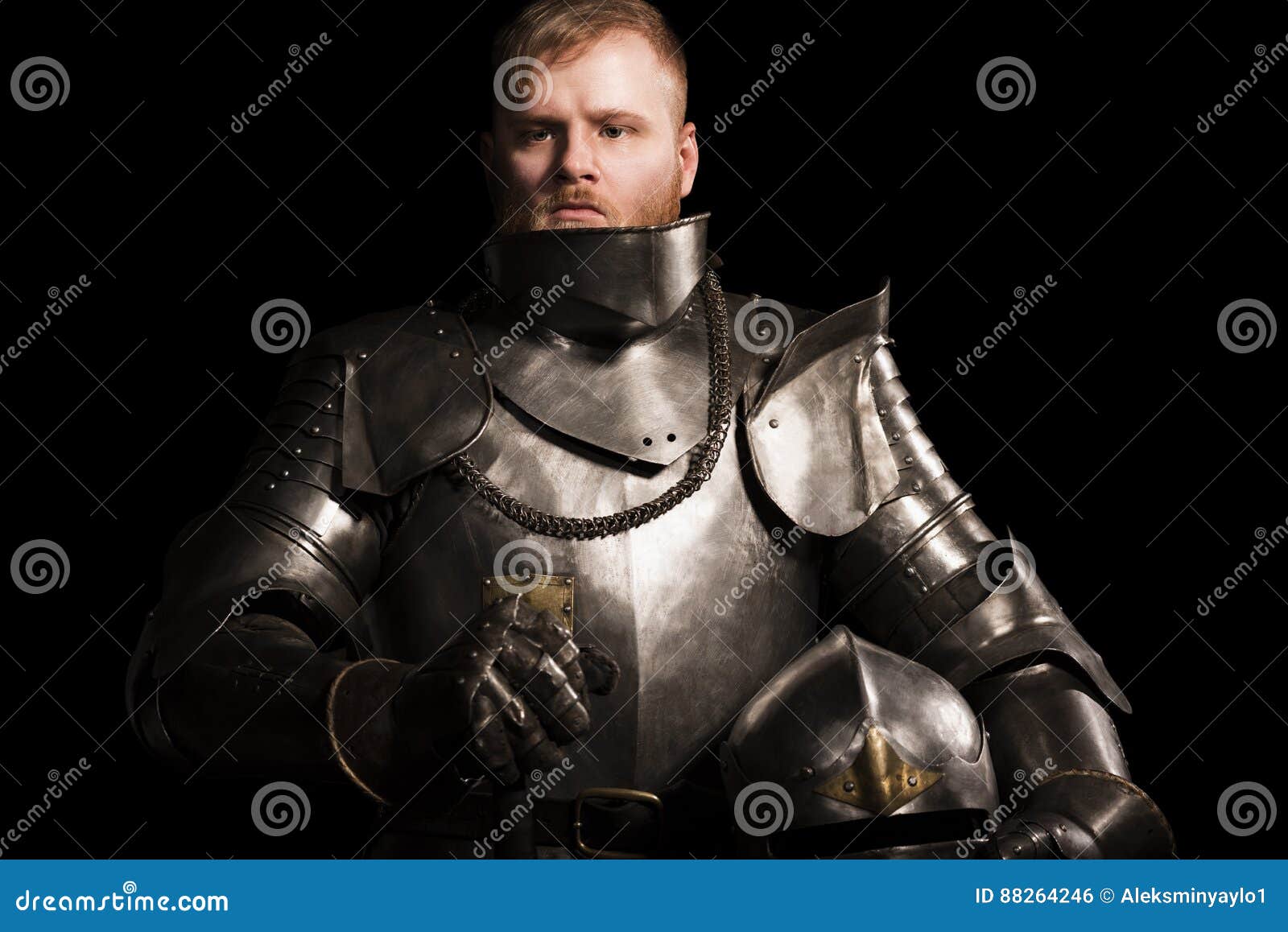 Knight in Armour after Battle on the Black Background Stock Photo ...