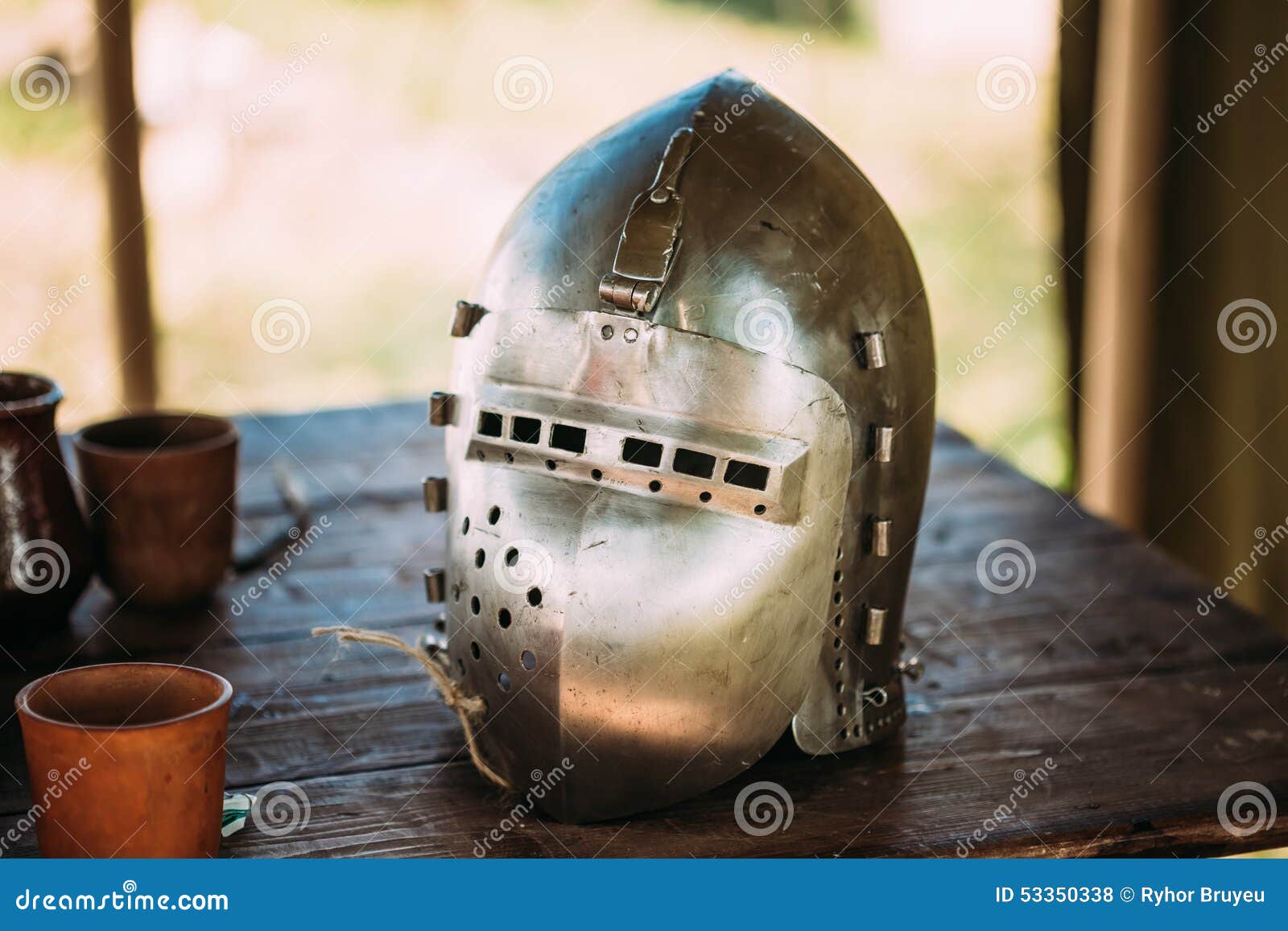 Knight Helmet of Medieval Suit of Armour on Table Stock Photo - Image ...