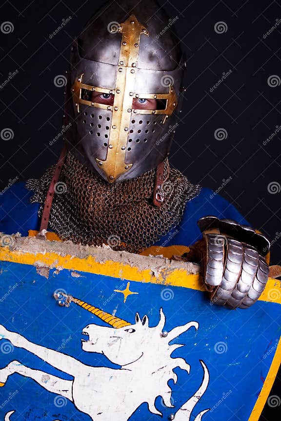 Knight Hiding Behind Shield Stock Photo - Image of helmet, courage ...