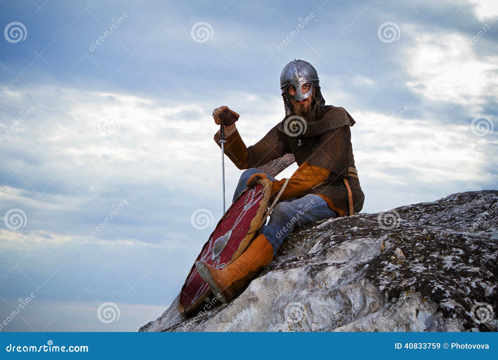 Knight Sitting on a Rock with a Sword Stock Image - Image of powerful ...