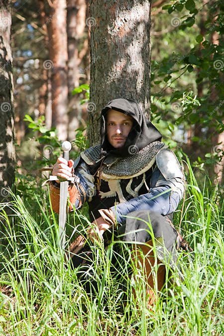 Knight Sitting Under the Tree Stock Photo - Image of forest, fight ...