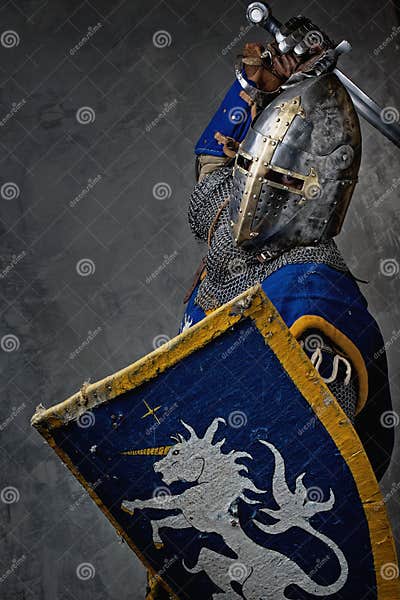 Knight with a Sword and Shield Attacking Stock Image - Image of coat ...