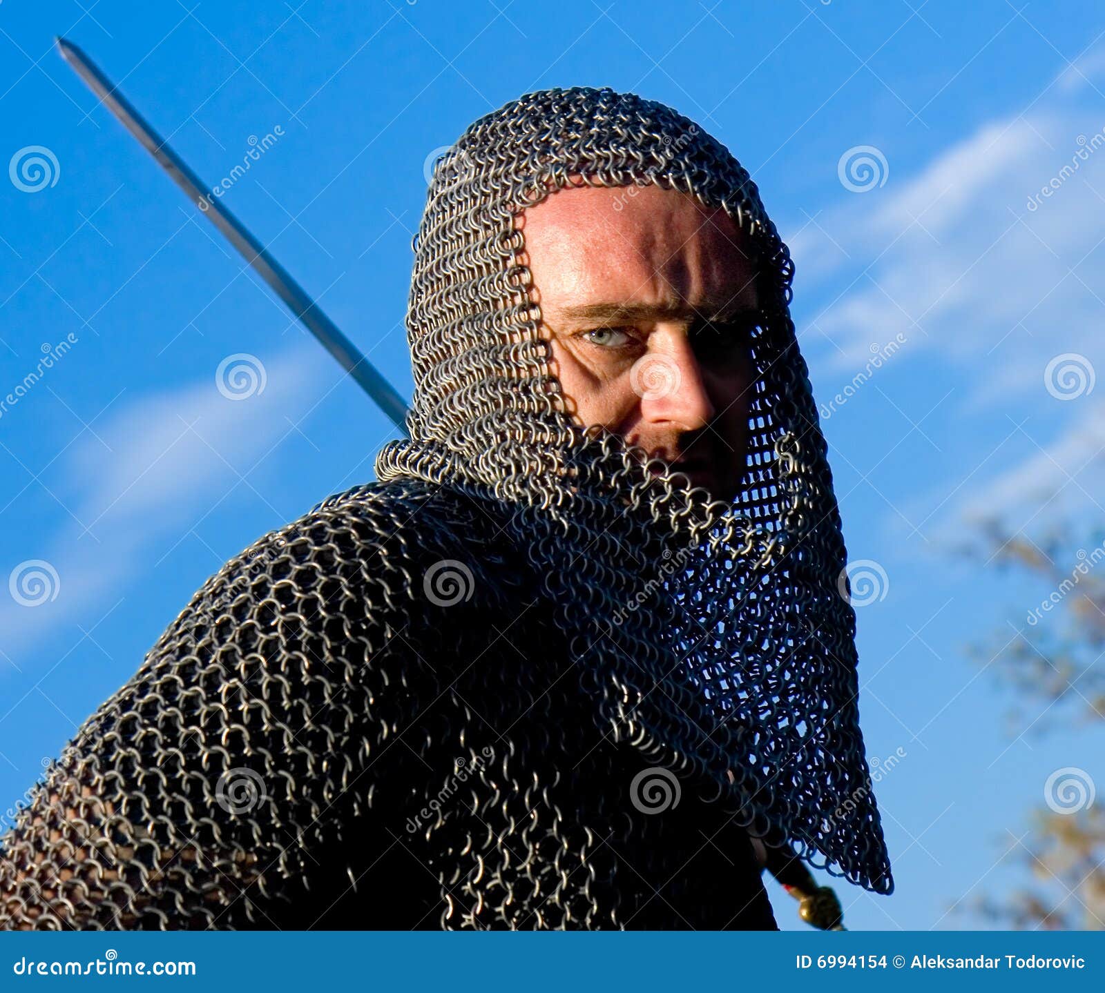 Knight Wearing Armour and Hold on a Sword Stock Photo - Image of ...