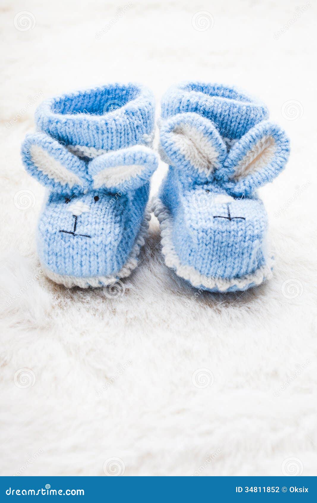 Knitted baby booties stock photo. Image of cute, rabbit - 34811852