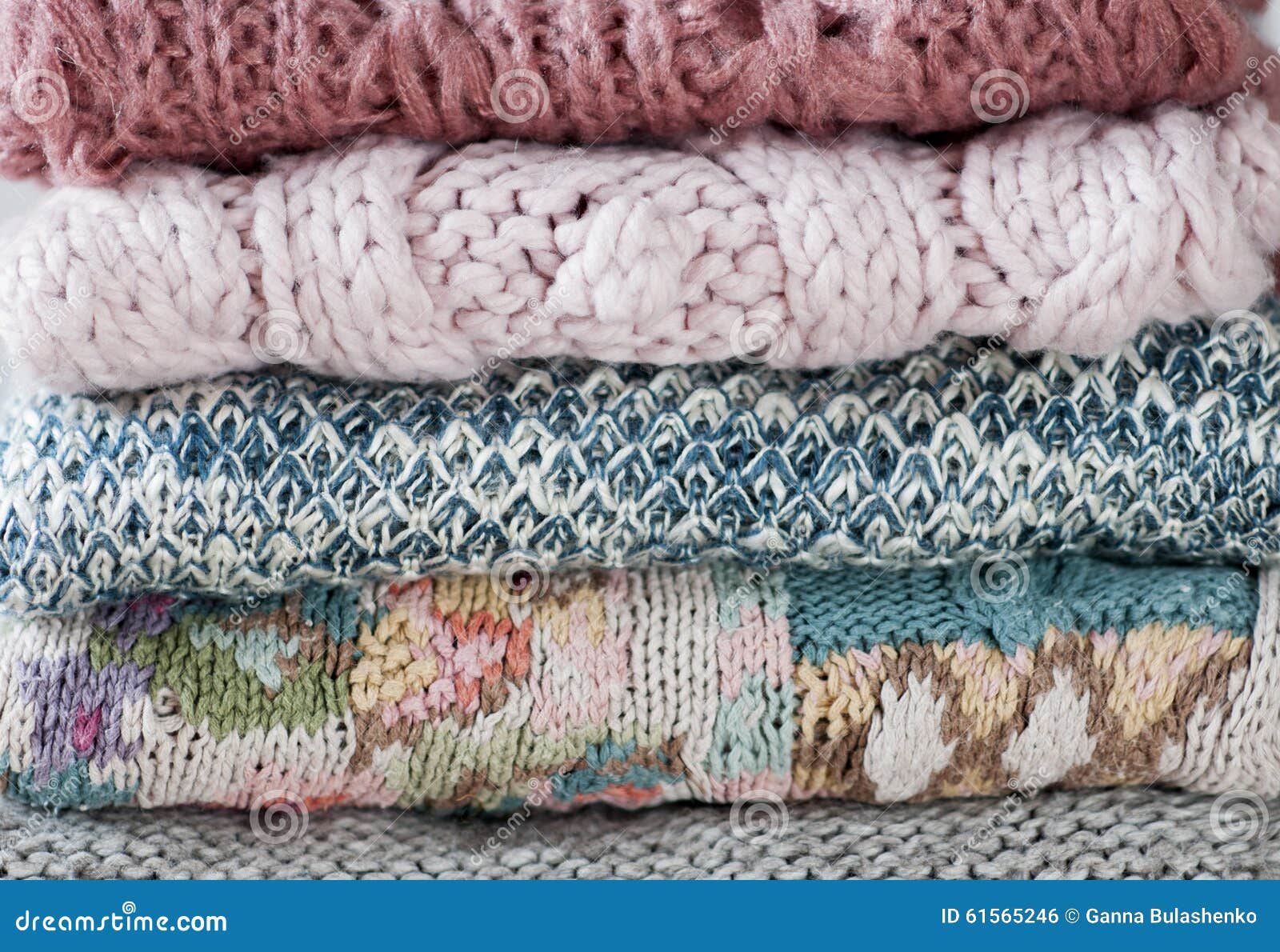 Knitted clothes stacked stock photo. Image of folded - 61565246