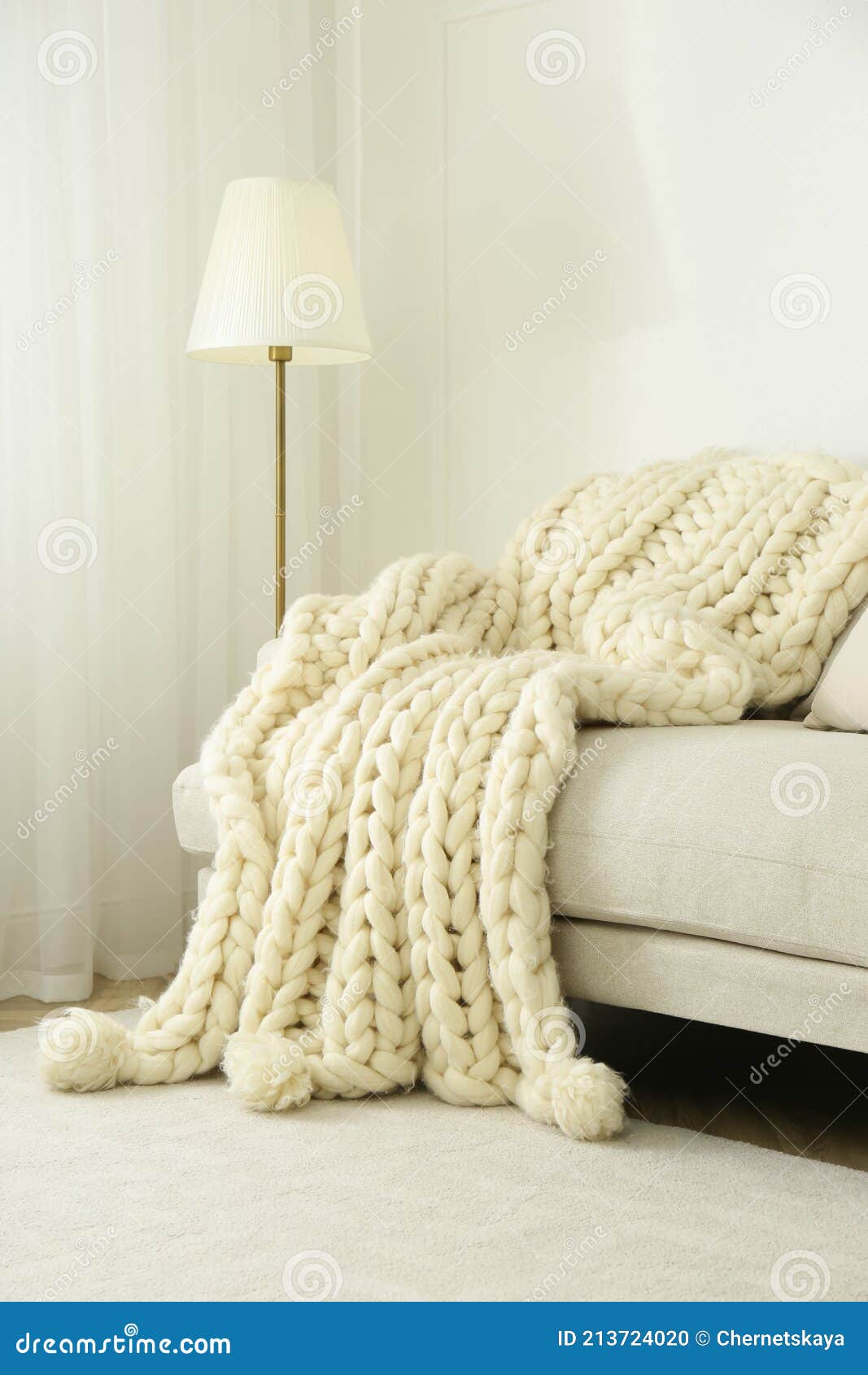Knitted Merino Wool Plaid on Sofa in Room Stock Photo - Image of knit ...