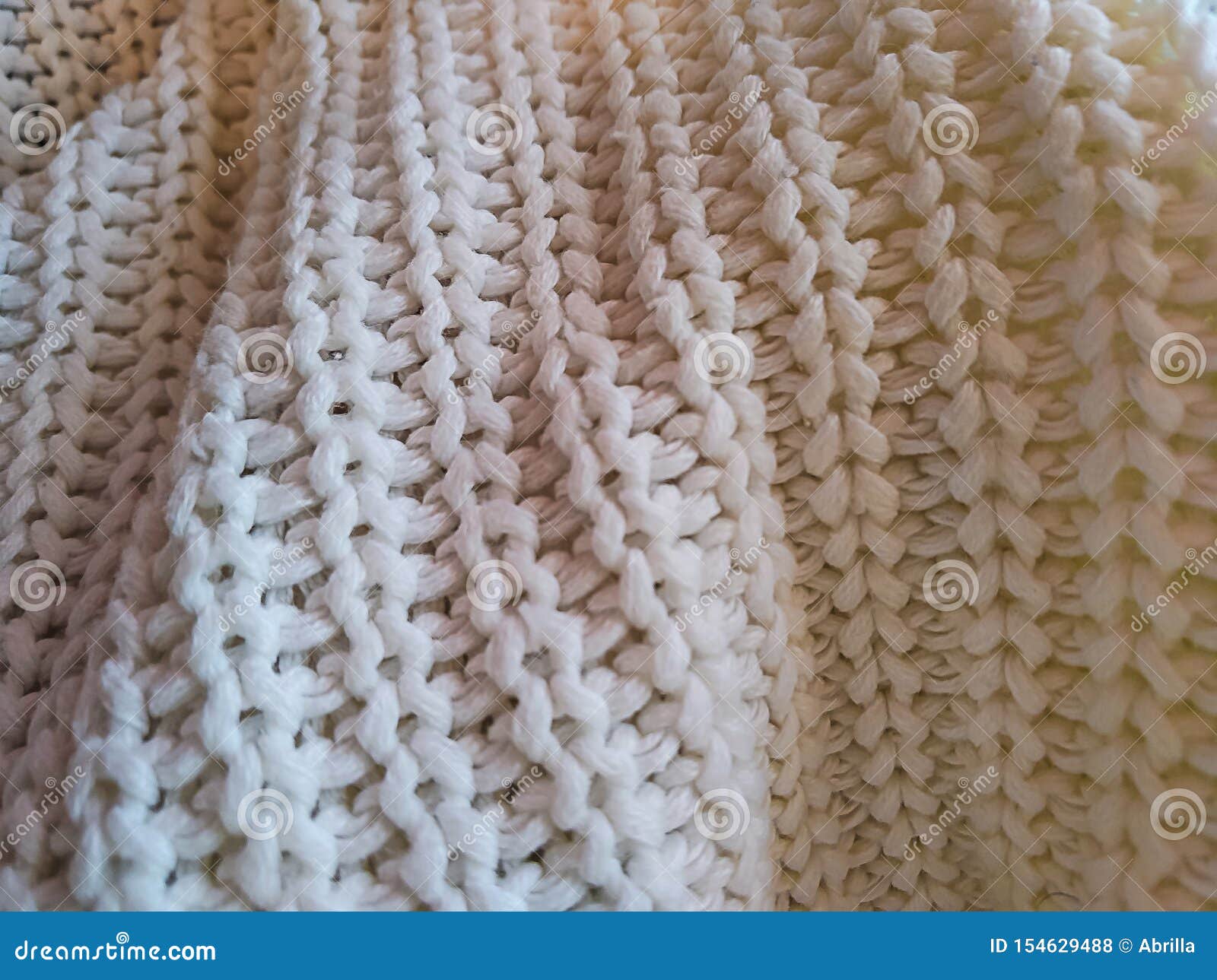 Knitted Pattern from White Wool. Knitted Fabric, Handmade Stock Photo ...