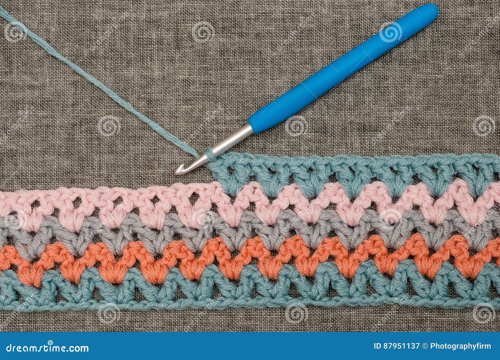 Knitting Hook and Crocheted Band with Wavy Color Pattern Stock Image ...
