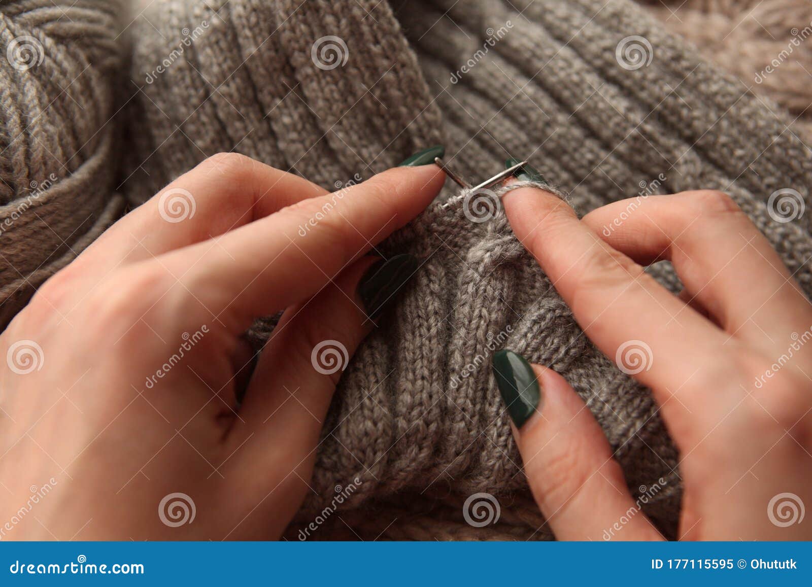 Knitting - Young Womans Hands Using Knitting Needles and Grey Wool Roll ...