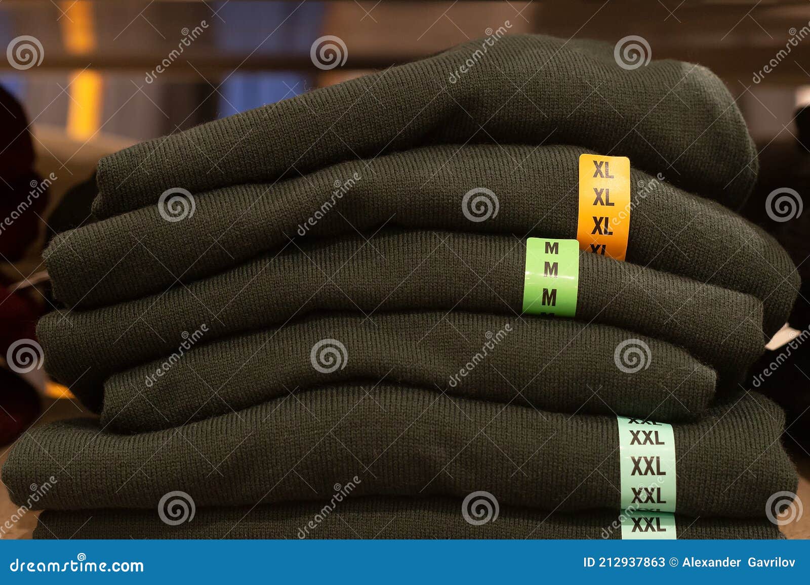 A Knitwear, a Stack of Green Sweaters, Clothing Stock Image - Image of ...
