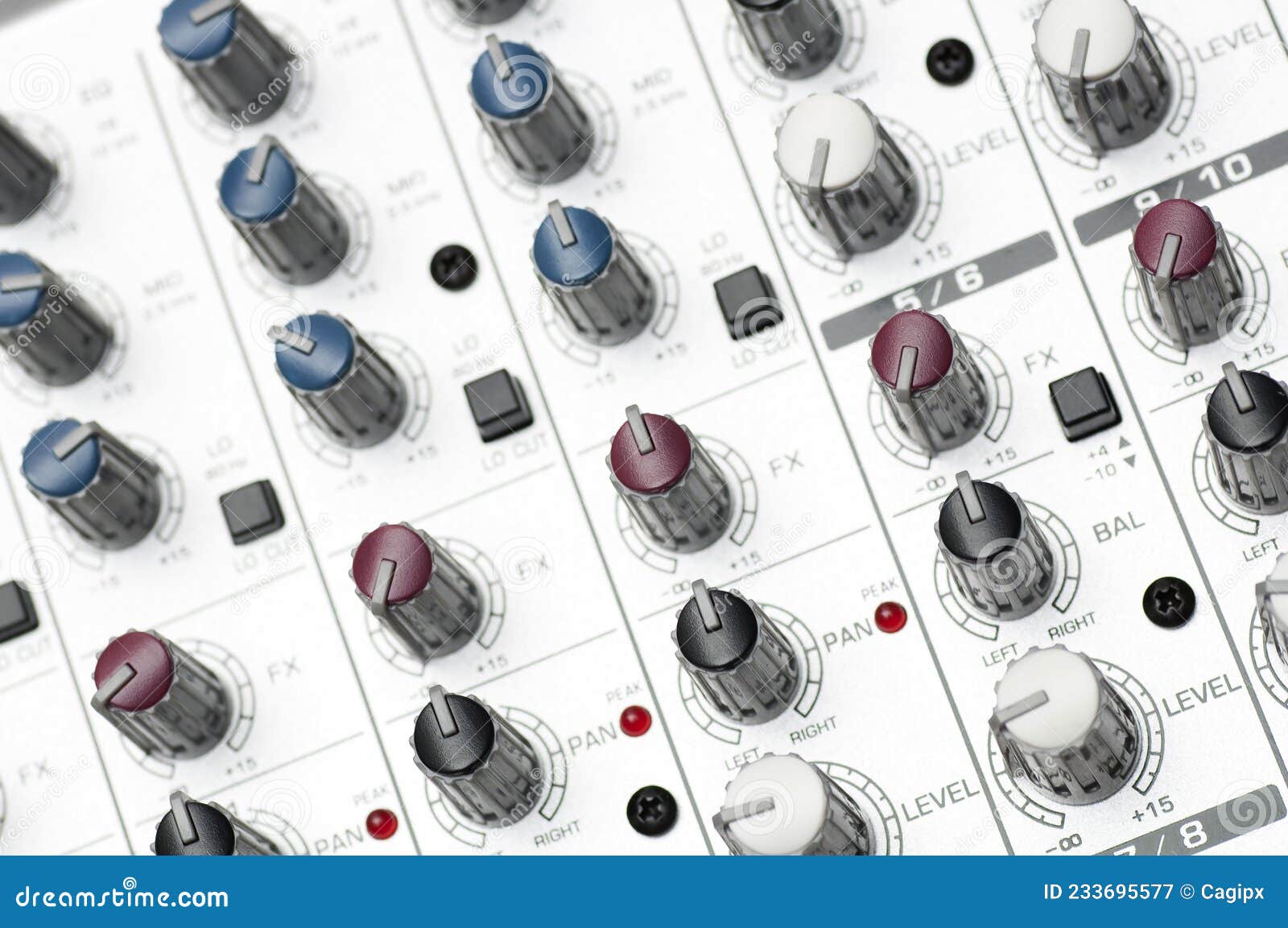 Knobs of a sound mixer. stock image. Image of sound - 233695577