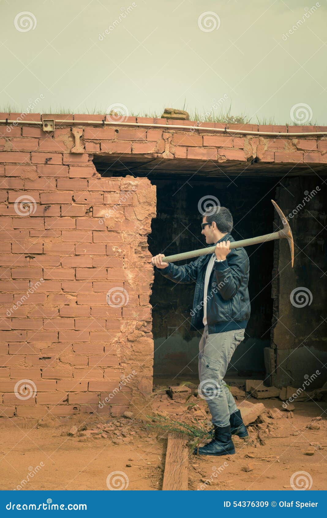 Knocking down a wall stock image. Image of demolished - 54376309