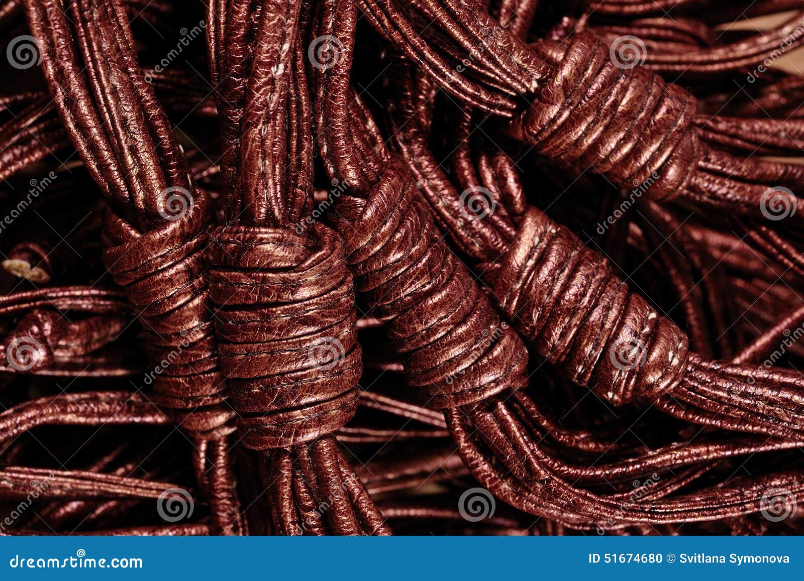 Knots on leather straps stock photo. Image of handicraft - 51674680