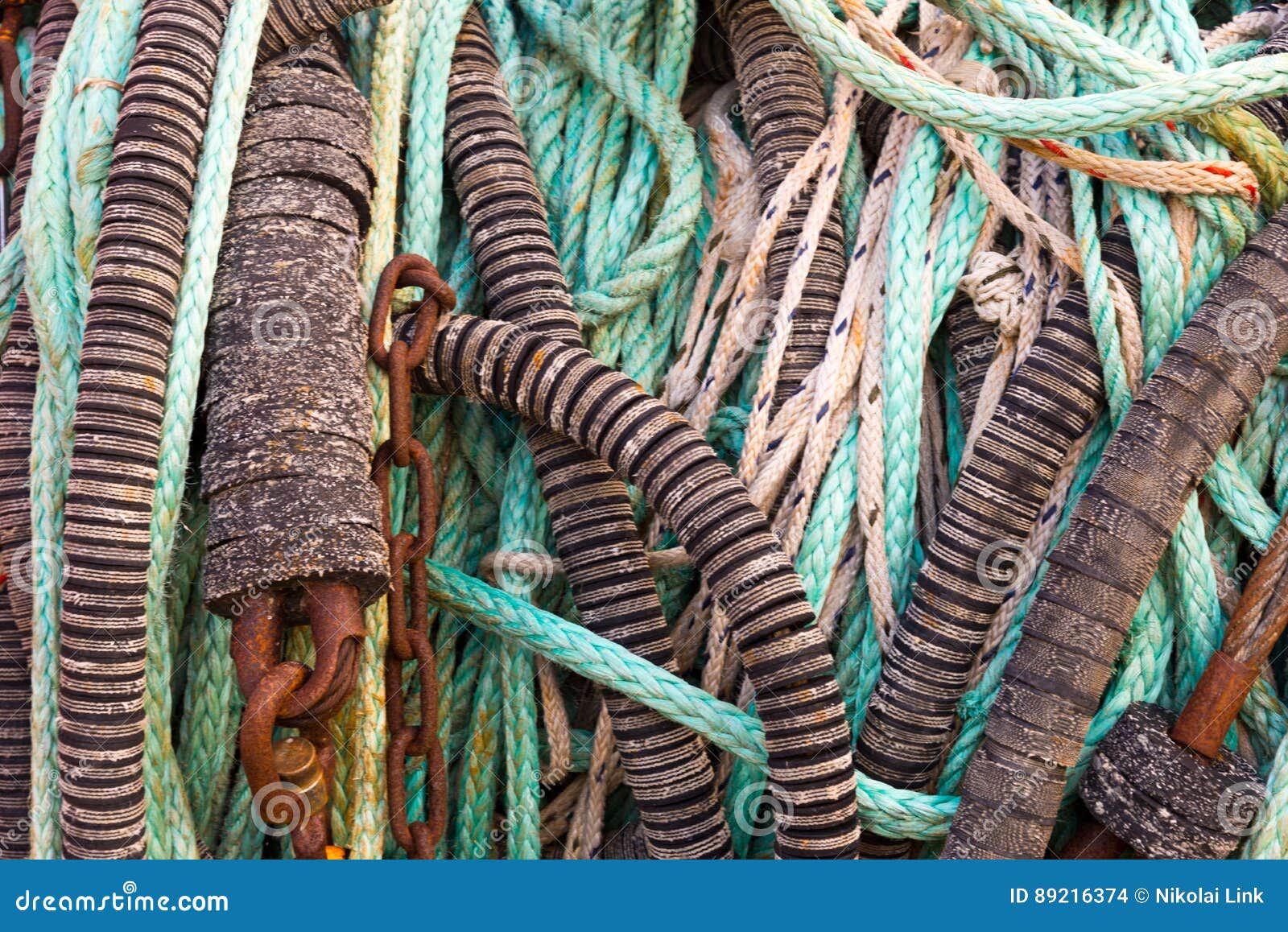Knotted and tangled ropes stock photo. Image of gray - 89216374