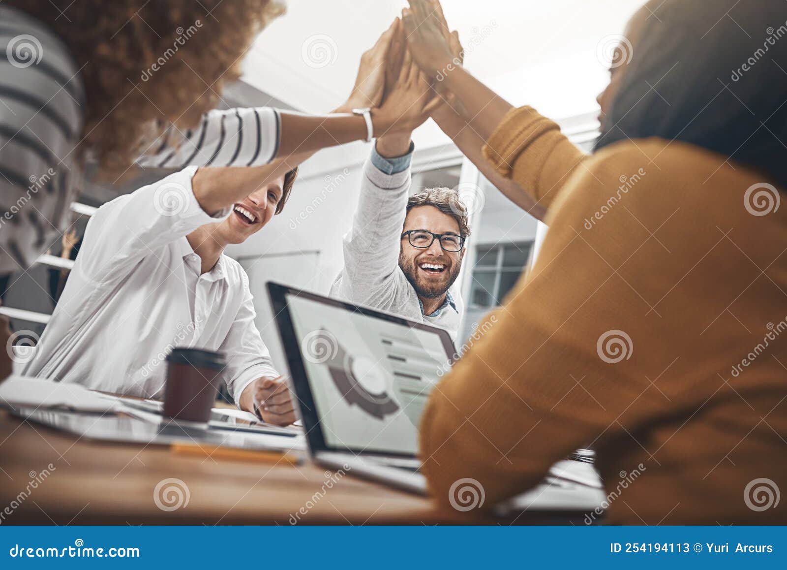 We Know we Can Depend on Each Other. Colleagues High-fiving in the ...
