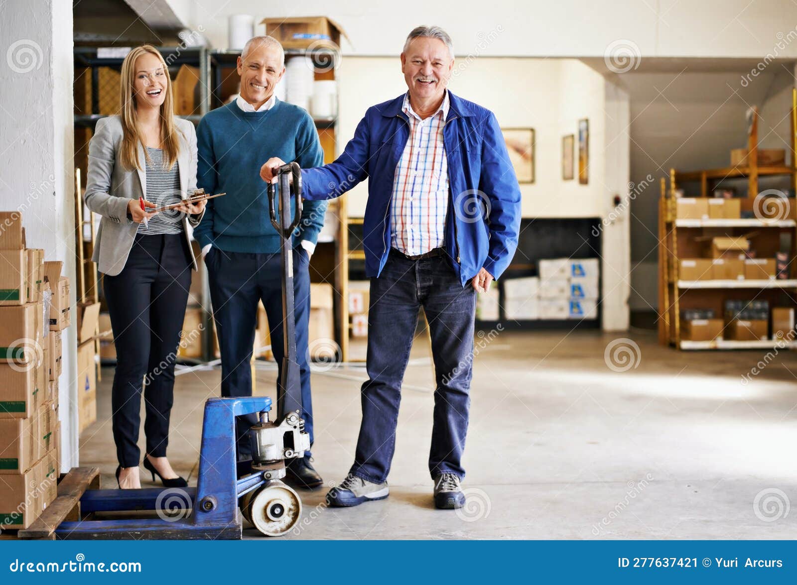 We Know Every Inch of this Warehouse by Heart. Portrait of People at ...