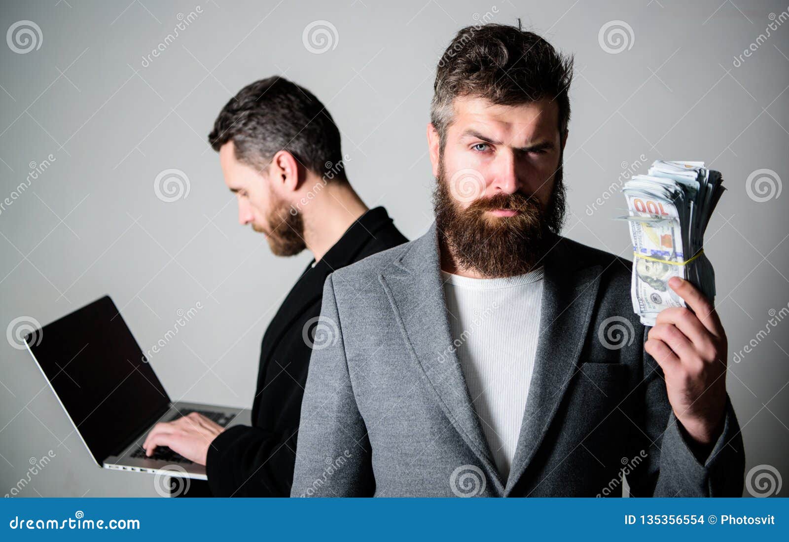 They Know How To Make Money. Team of Web Developer with Laptop and ...