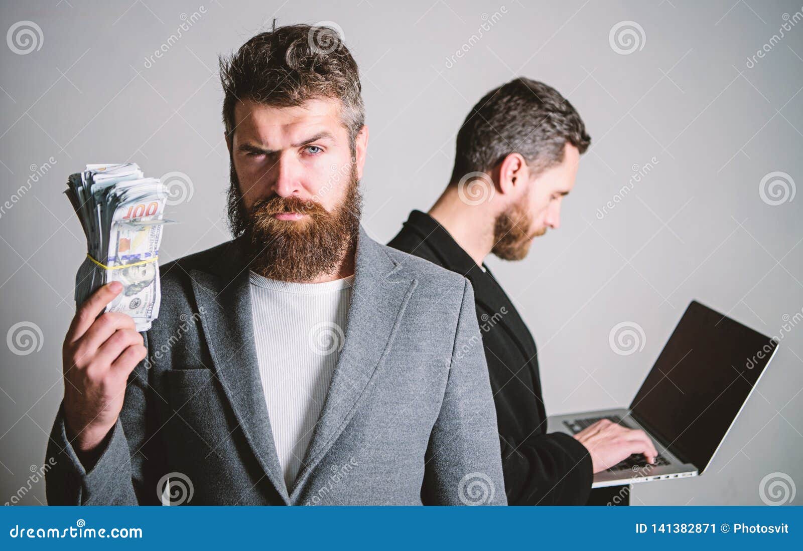 They Know How To Make Money. Team of Web Developer with Laptop and ...