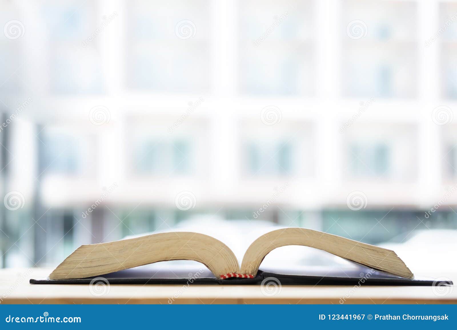 Knowledge Concept, a Book Open on Wood Table with Copy Space. Stock ...