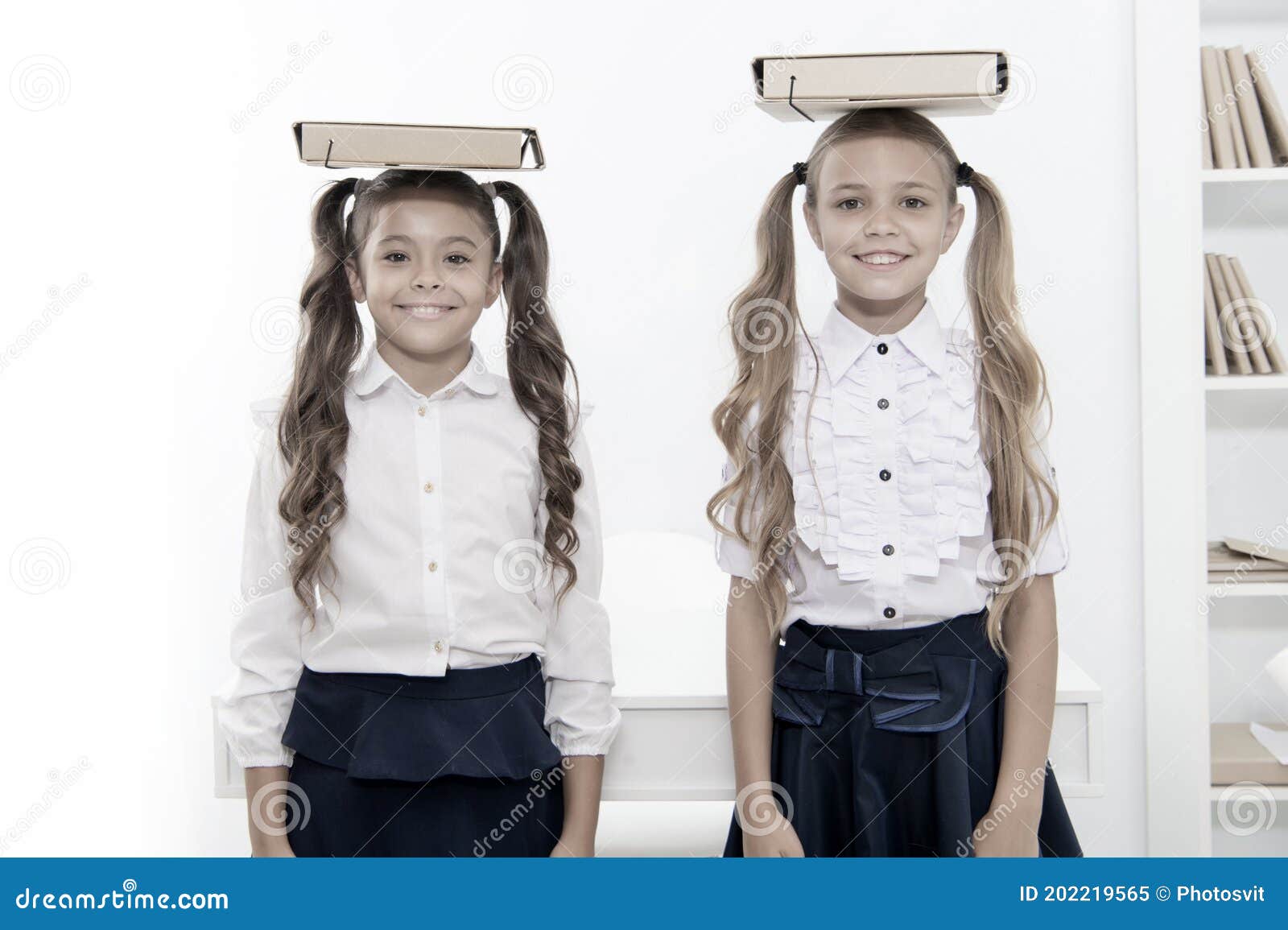 Knowledge Day. Small Girls Children in School on Knowledge Day. Small ...