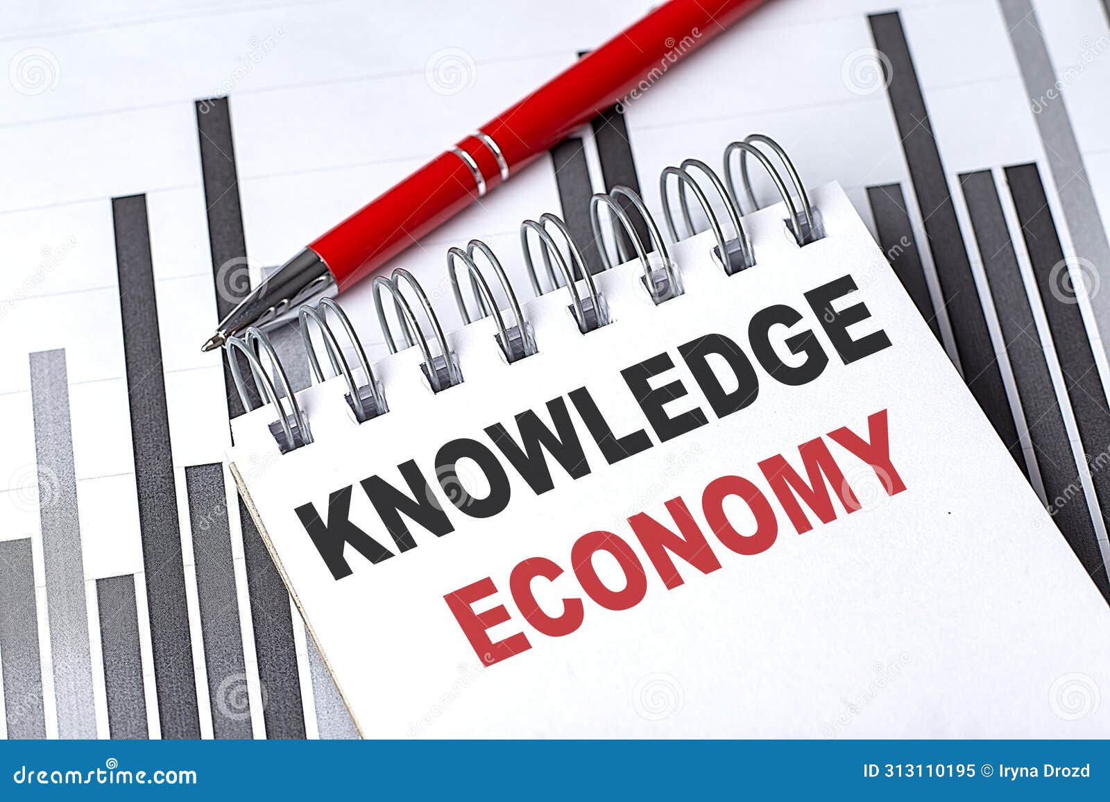 KNOWLEDGE ECONOMY Text on Notebook on Chart with Pen Stock Image ...