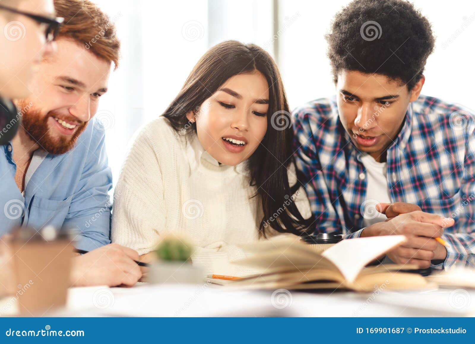 Knowledge and Education Concept. Happy Students in Library Stock Image ...