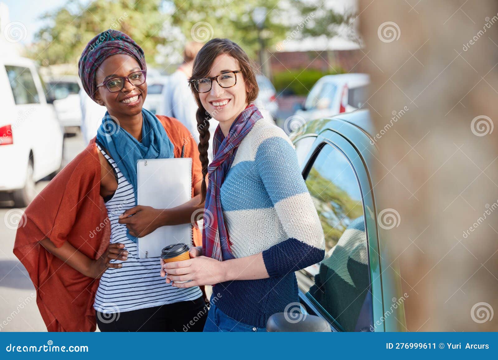 Knowledge is Empowering. Portrait of Two University Students Hanging ...