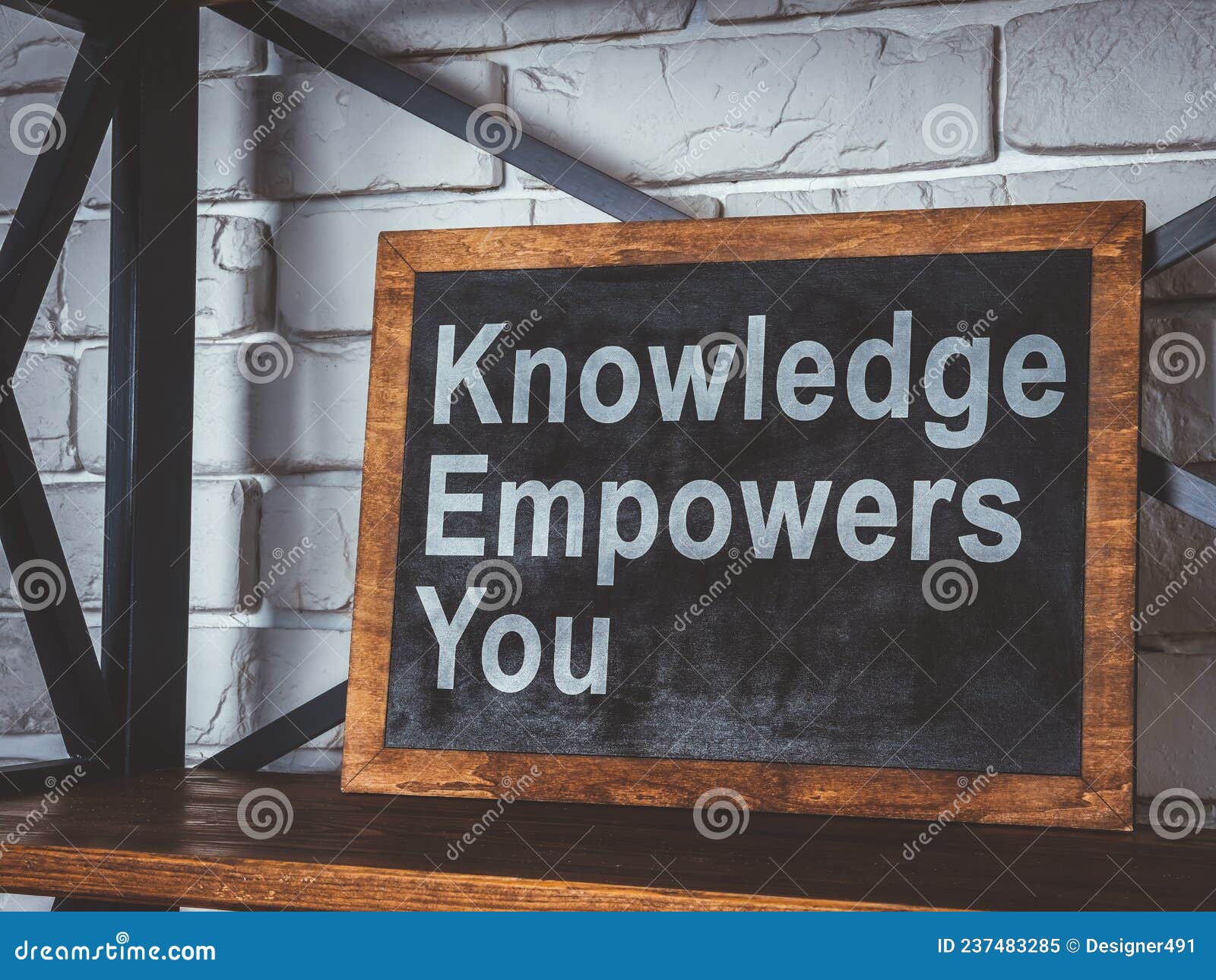 Knowledge Empowers You Phrase on the Blackboard. Stock Image - Image of ...