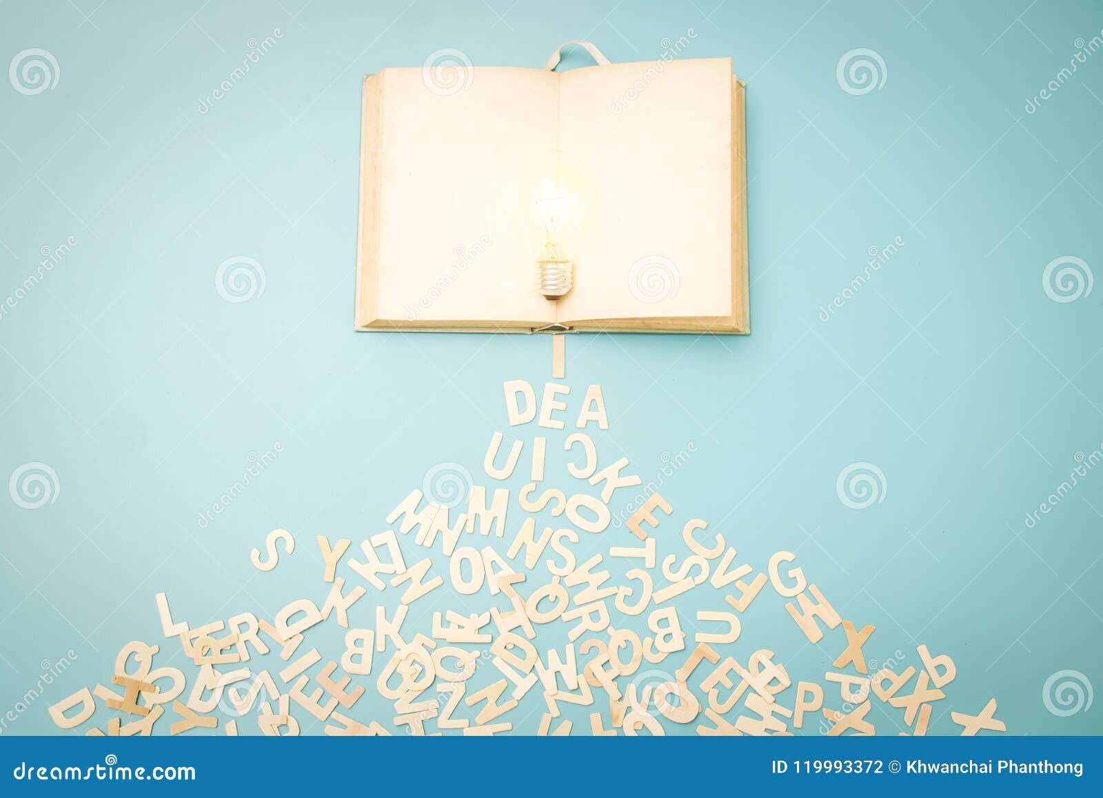 Knowledge and Idea Concept, Light Bulb on Blue Background Rele Stock ...