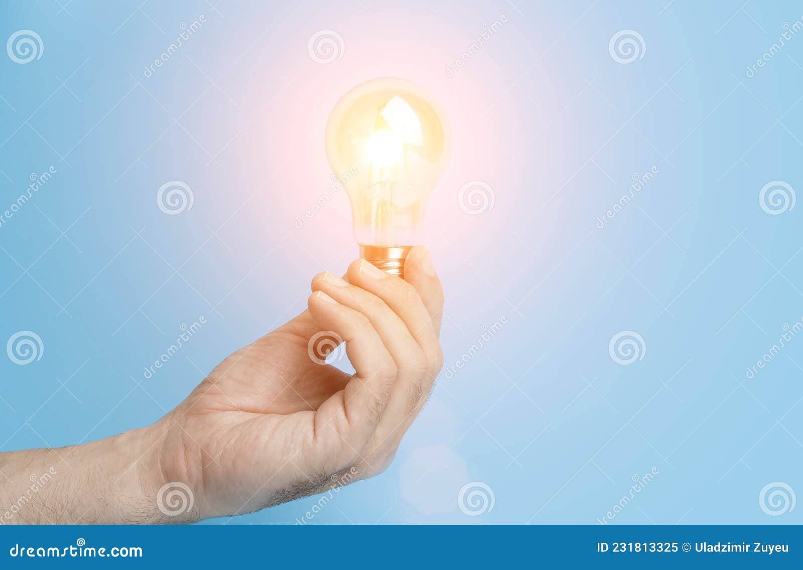 Knowledge and Idea Concept. Light Bulb with Light in Hand on a Blank ...