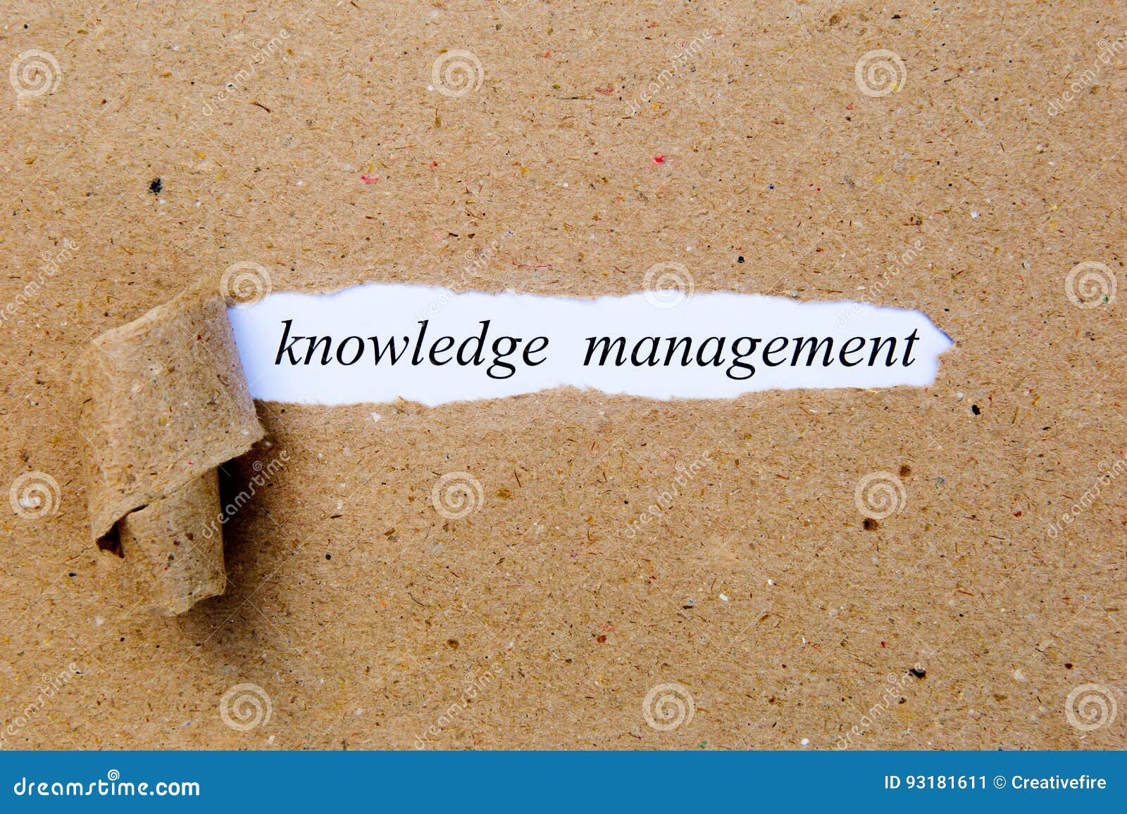 Knowledge Management - Printed Text Underneath Torn Brown Paper Stock ...