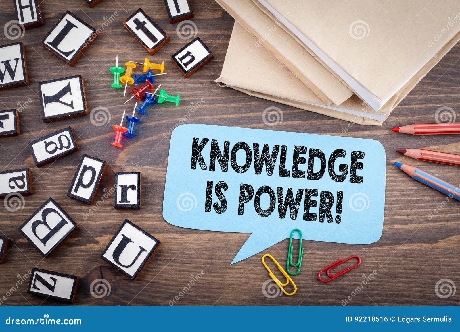 Knowledge is Power. Speech Bubble on a Dark Textured Wooden Background ...