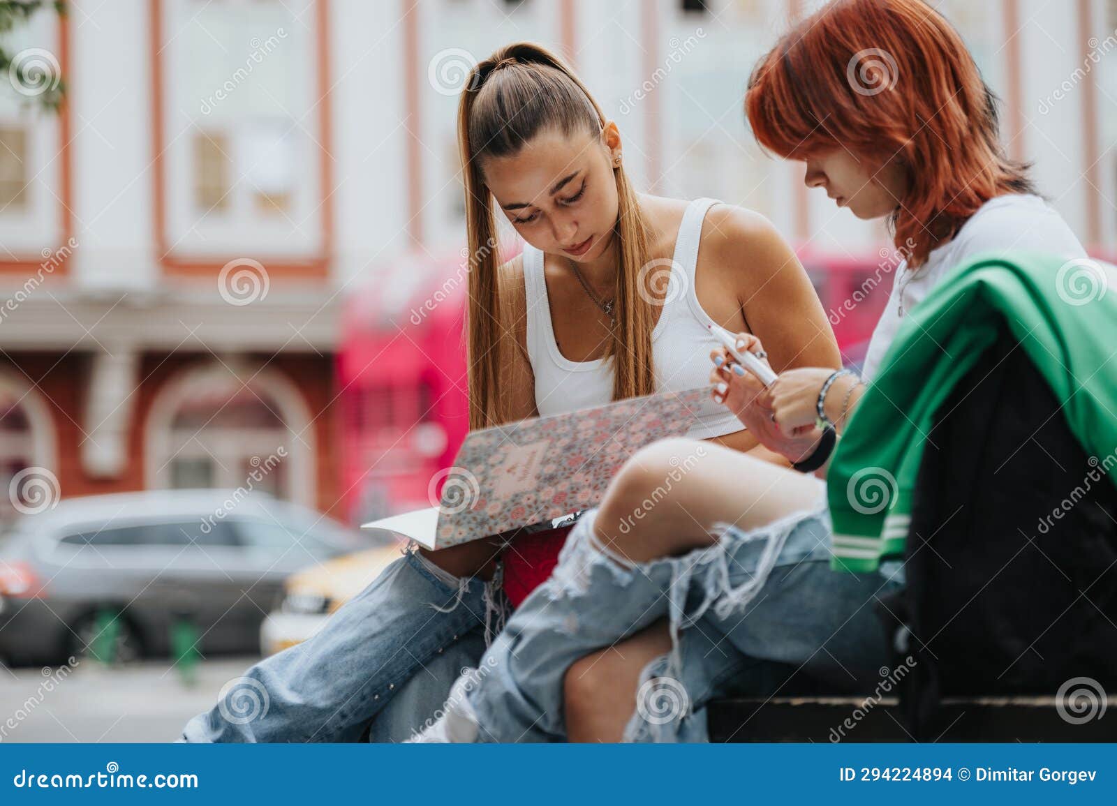 Knowledge Sharing: Two Girls Enjoying E-Learning Outdoors Stock Photo ...