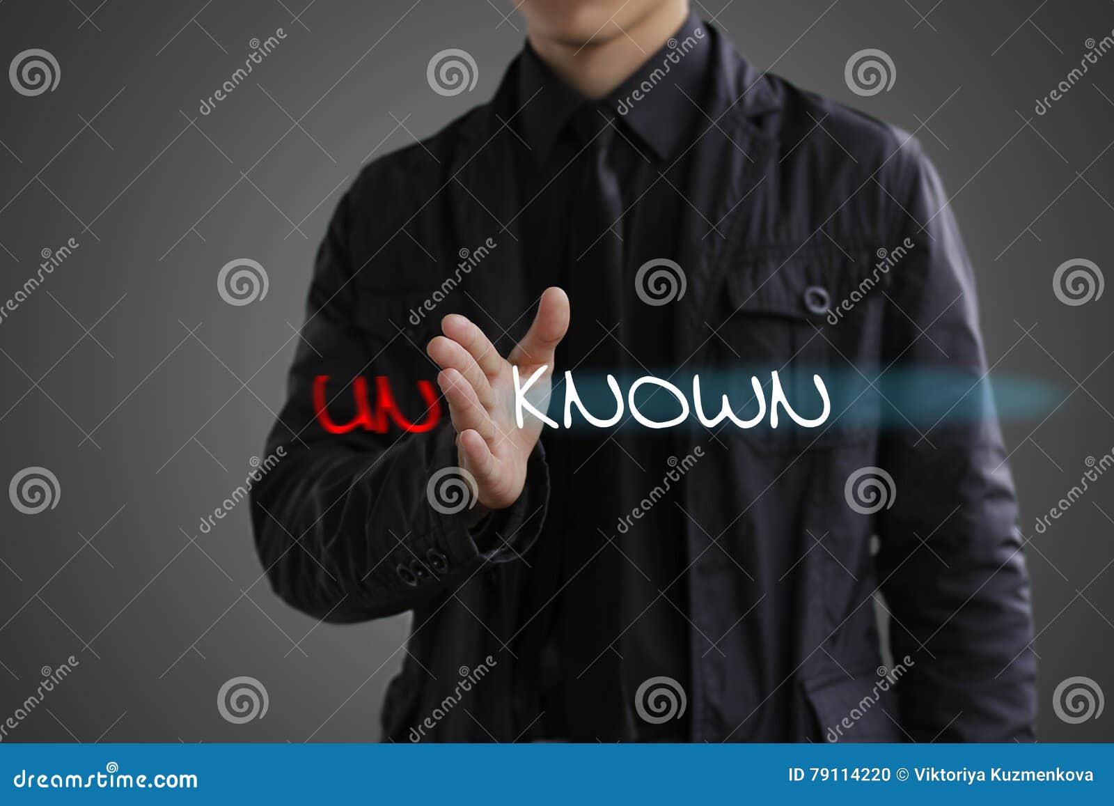 Known Concept. Businessman Makes the Unknown into Known Stock Photo ...
